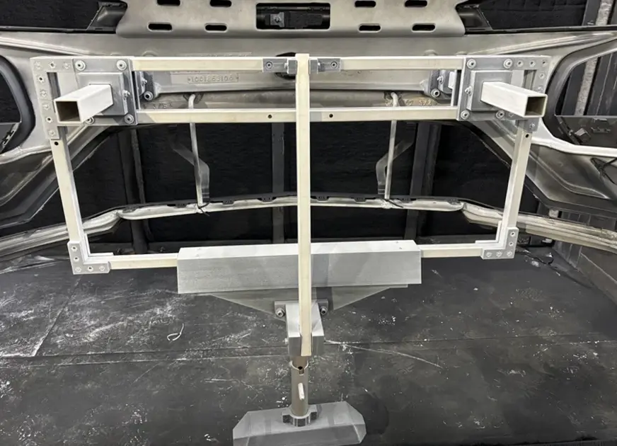 Omega Reduces Tooling Inventory with F3300 Modular Paint Fixtures